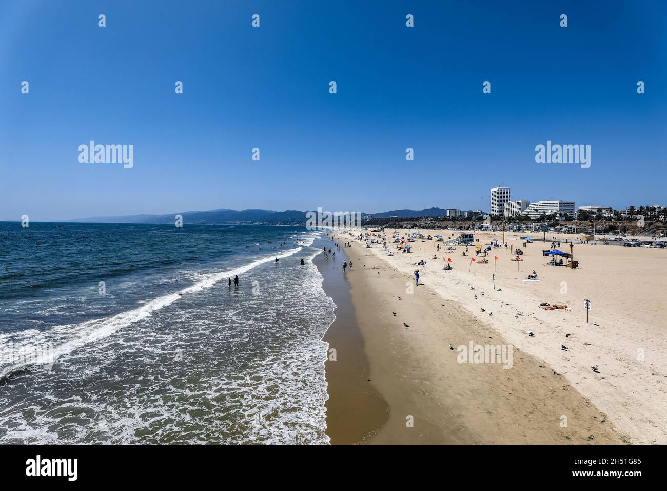 Beautiful view of a beach with splashing waves Stock Photo - Alamy