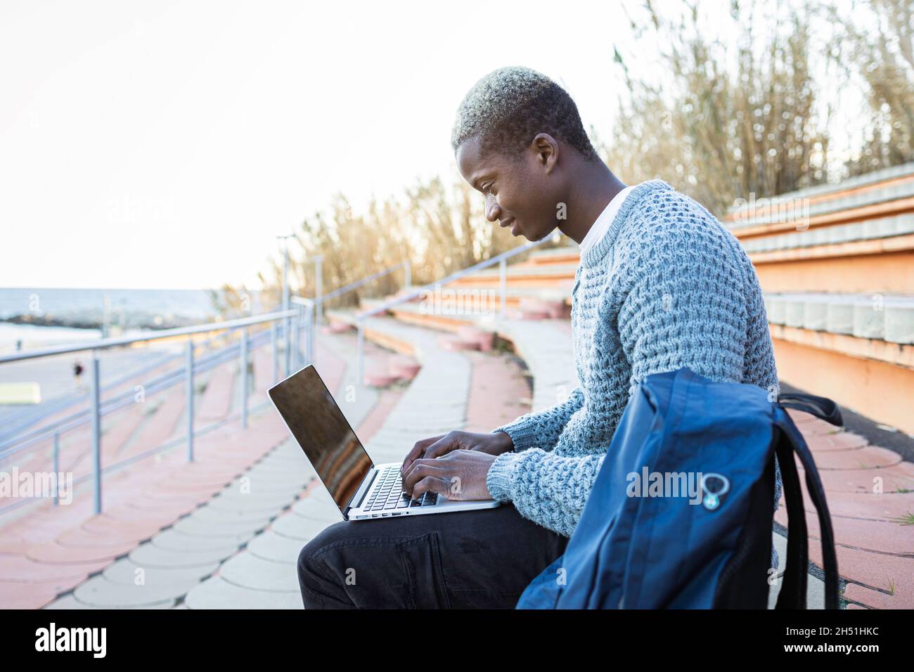 Black student using computer in hi-res stock photography and images - Alamy