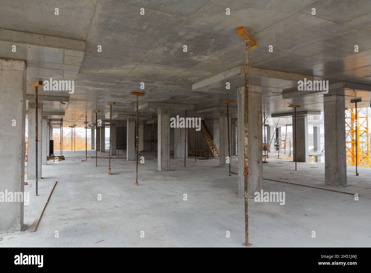 Concrete columns in the building frame. Inside the multistory ...