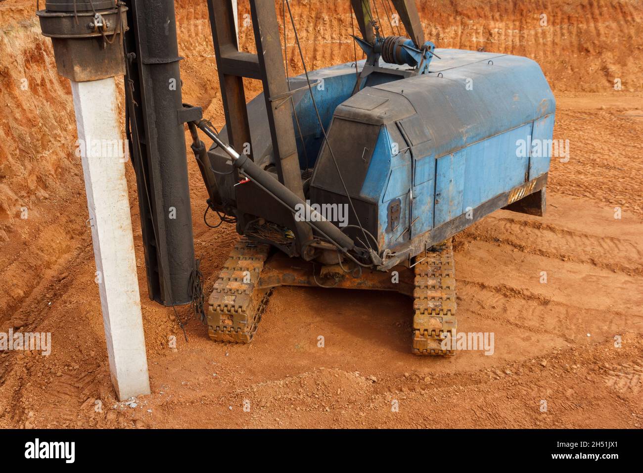 Pile driving machine. Diesel hammer pile driving machine working on ...