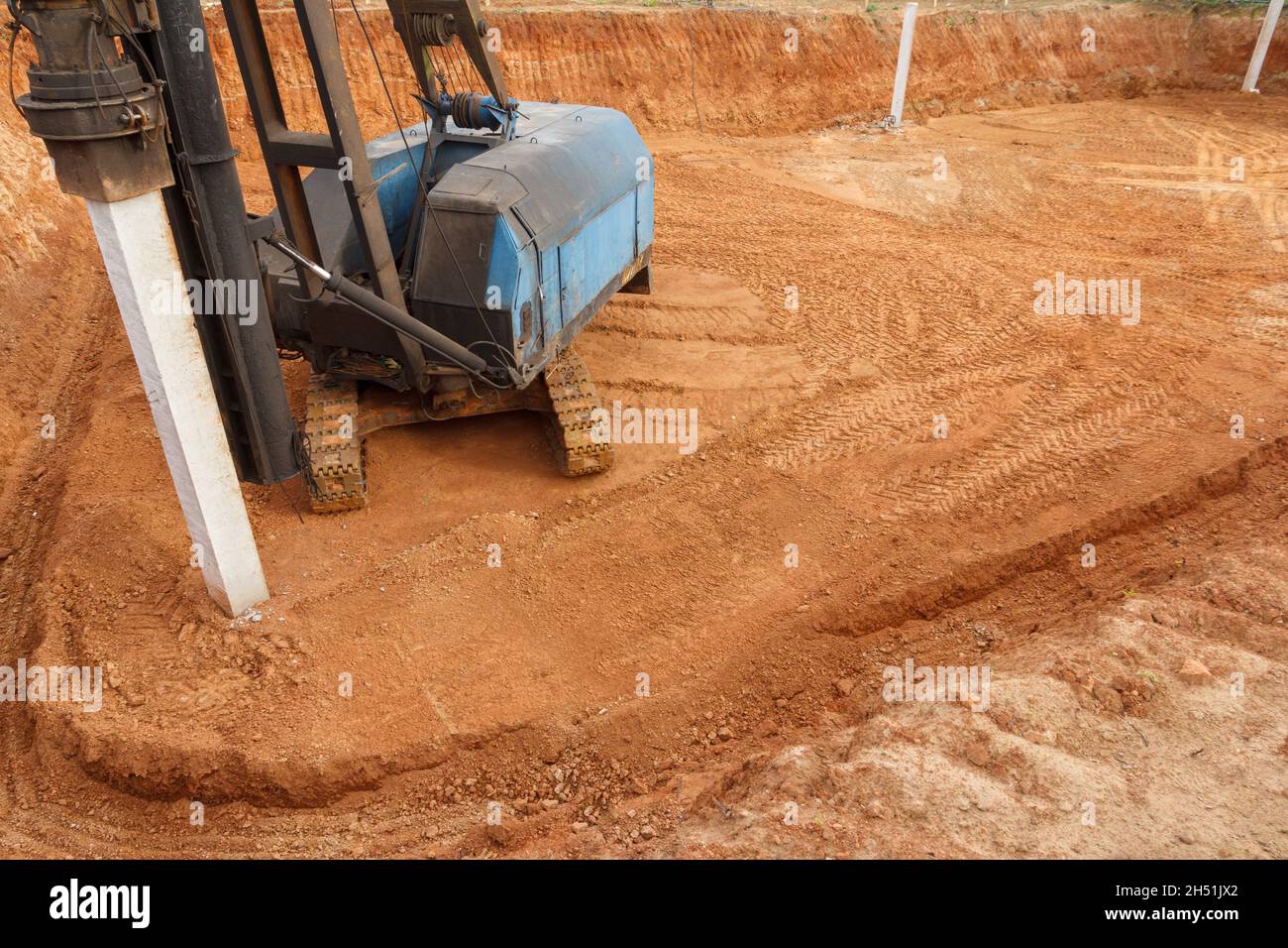 Pile driving machine. Diesel hammer pile driving machine working on ...