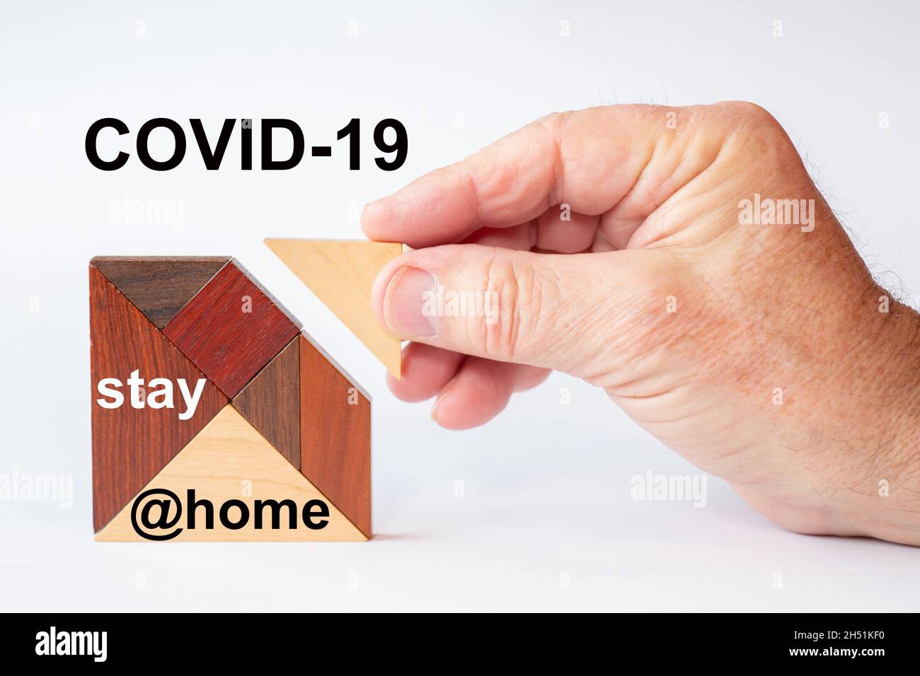 The missing building block is inserted into a tangram puzzle. The Text ...