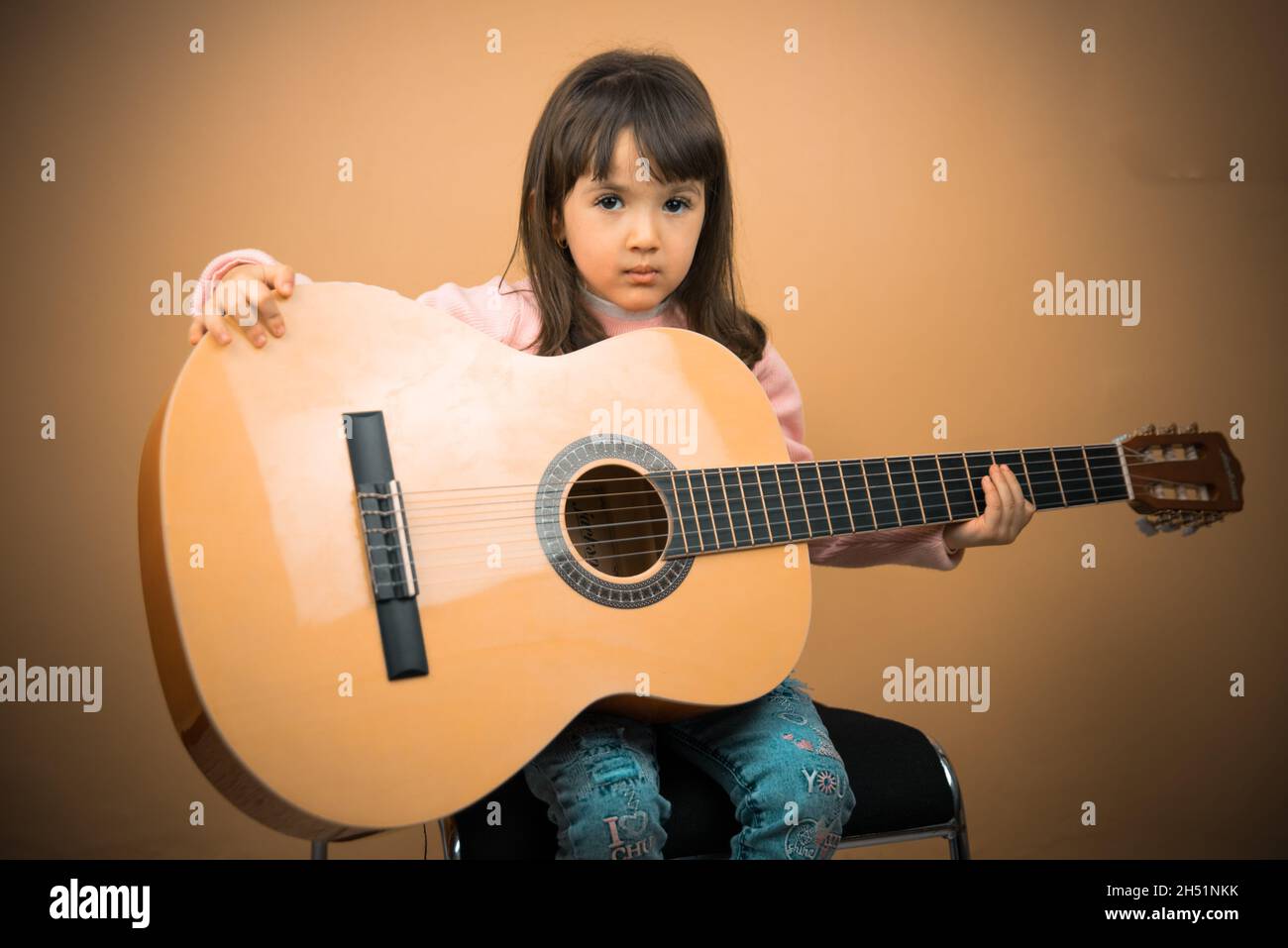kid plays guitar Stock Photo - Alamy