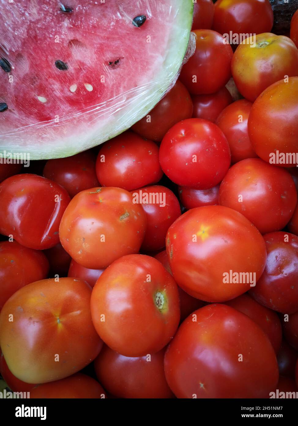 organically grown ripe tomatoes displayed at a street stall Stock Photo - Alamy