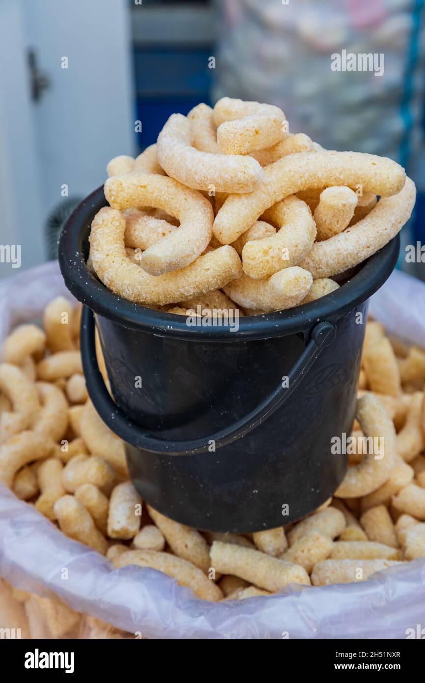Kulob, Khatlon Province, Tajikistan. Crunchy snacks in a market in ...