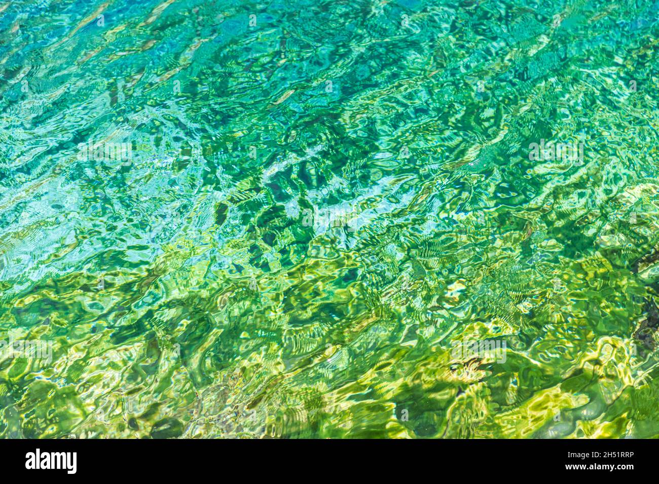 Haft Kul, Sughd Province, Tajikistan. Abstract patterns in the water of ...