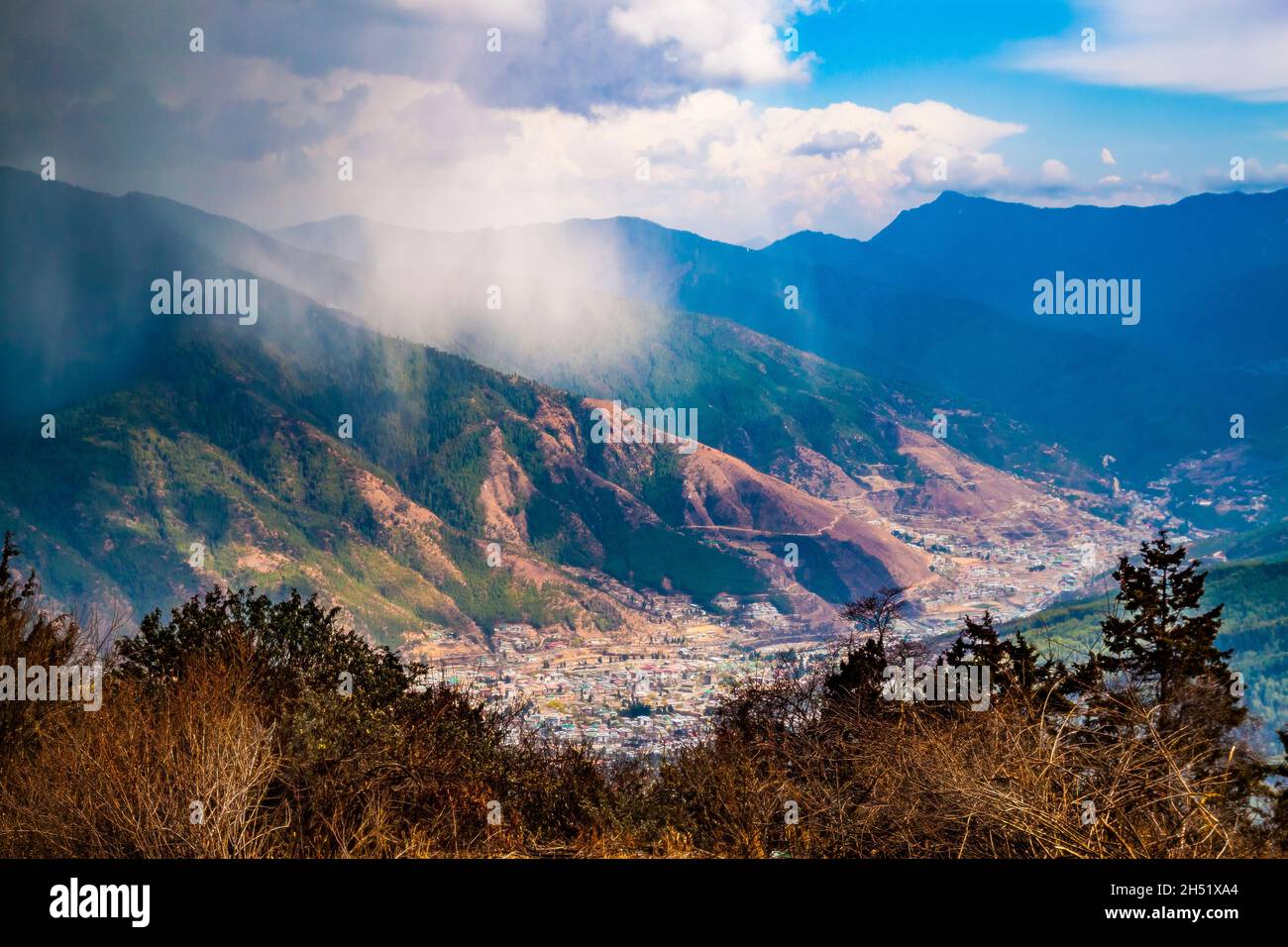 View of the city Thimphu, capital of Bhutan, from mountain cliff Stock ...