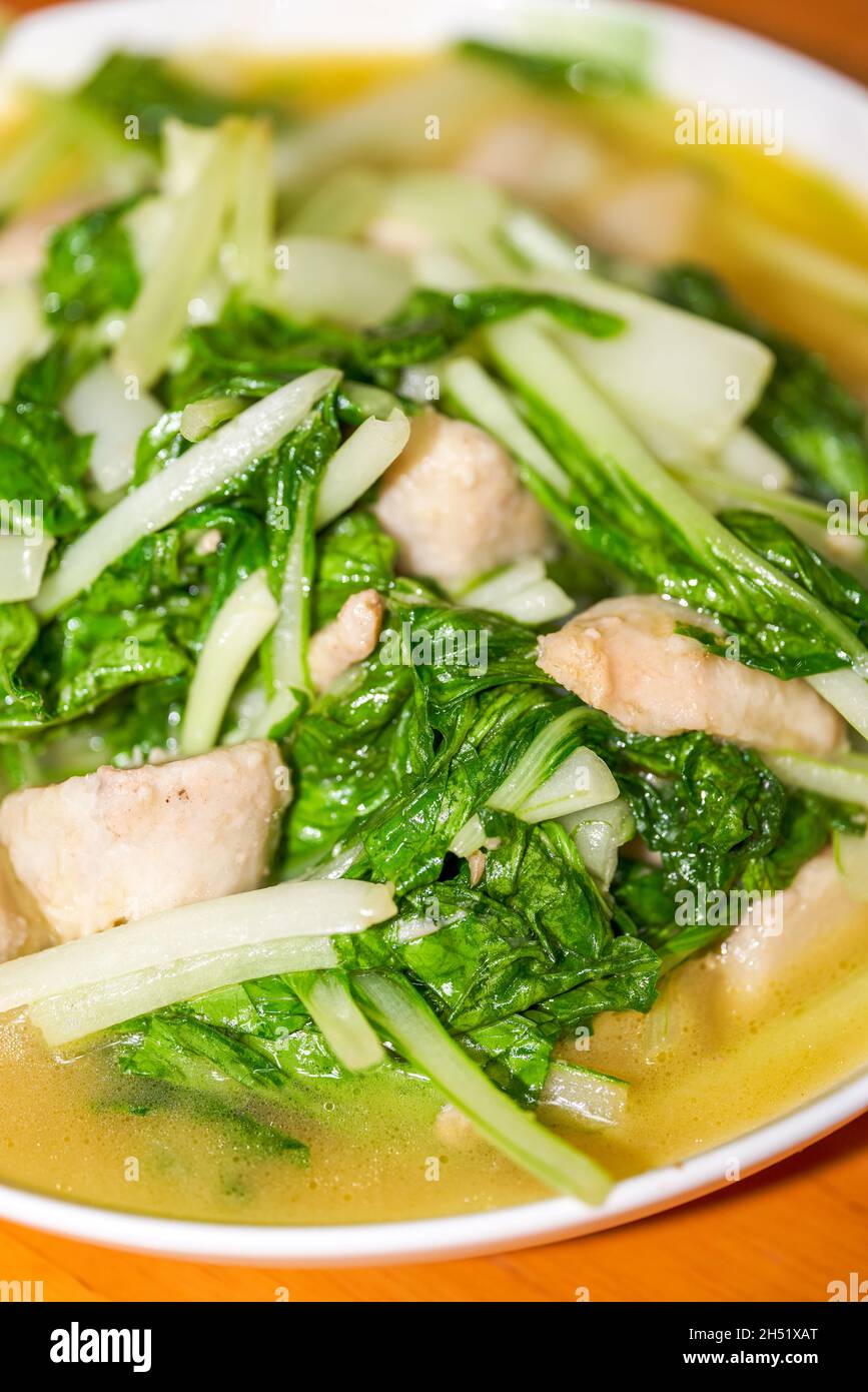 A delicious Chinese dish, braised cabbage with taro Stock Photo - Alamy