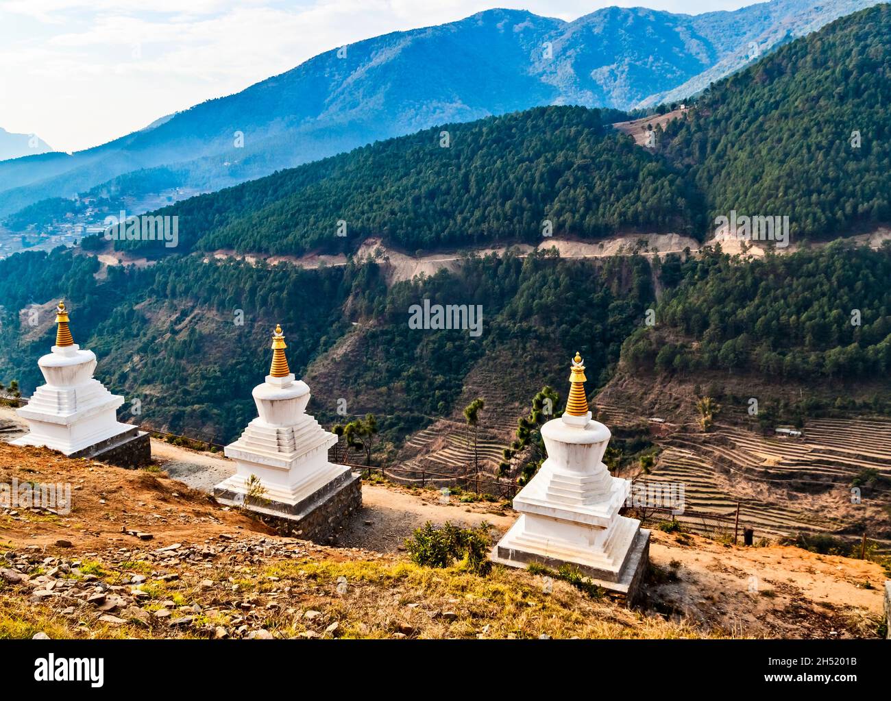 Small buddhist tower-shaped Stupa on background of Himalaya mountains ...
