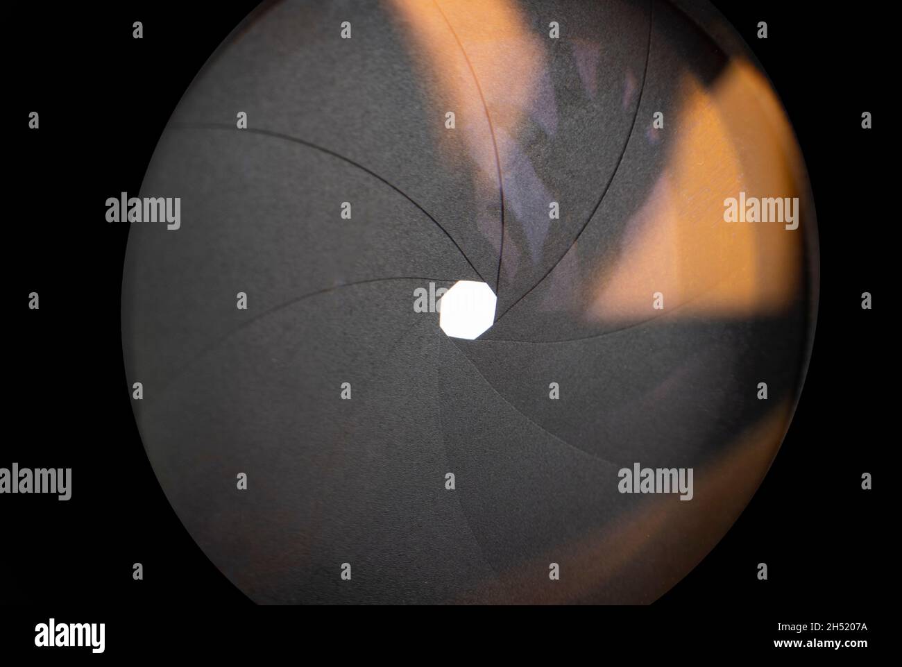 Lens photography camera. The diaphragm of a camera lens aperture. CLOSE ...