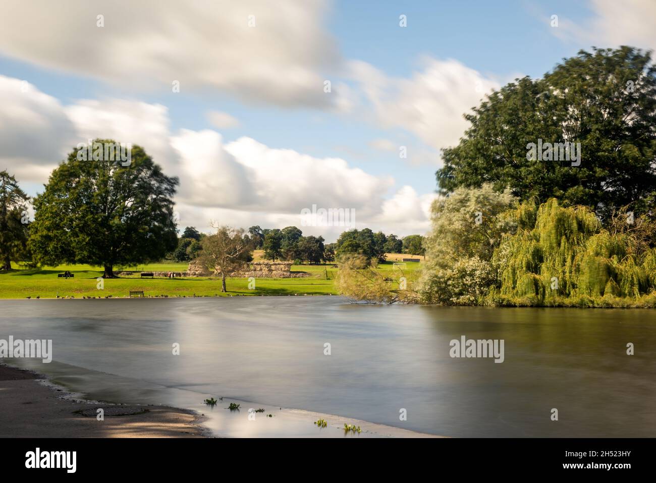 Beautiful lake landscape of water surrounded by trees Stock Photo - Alamy