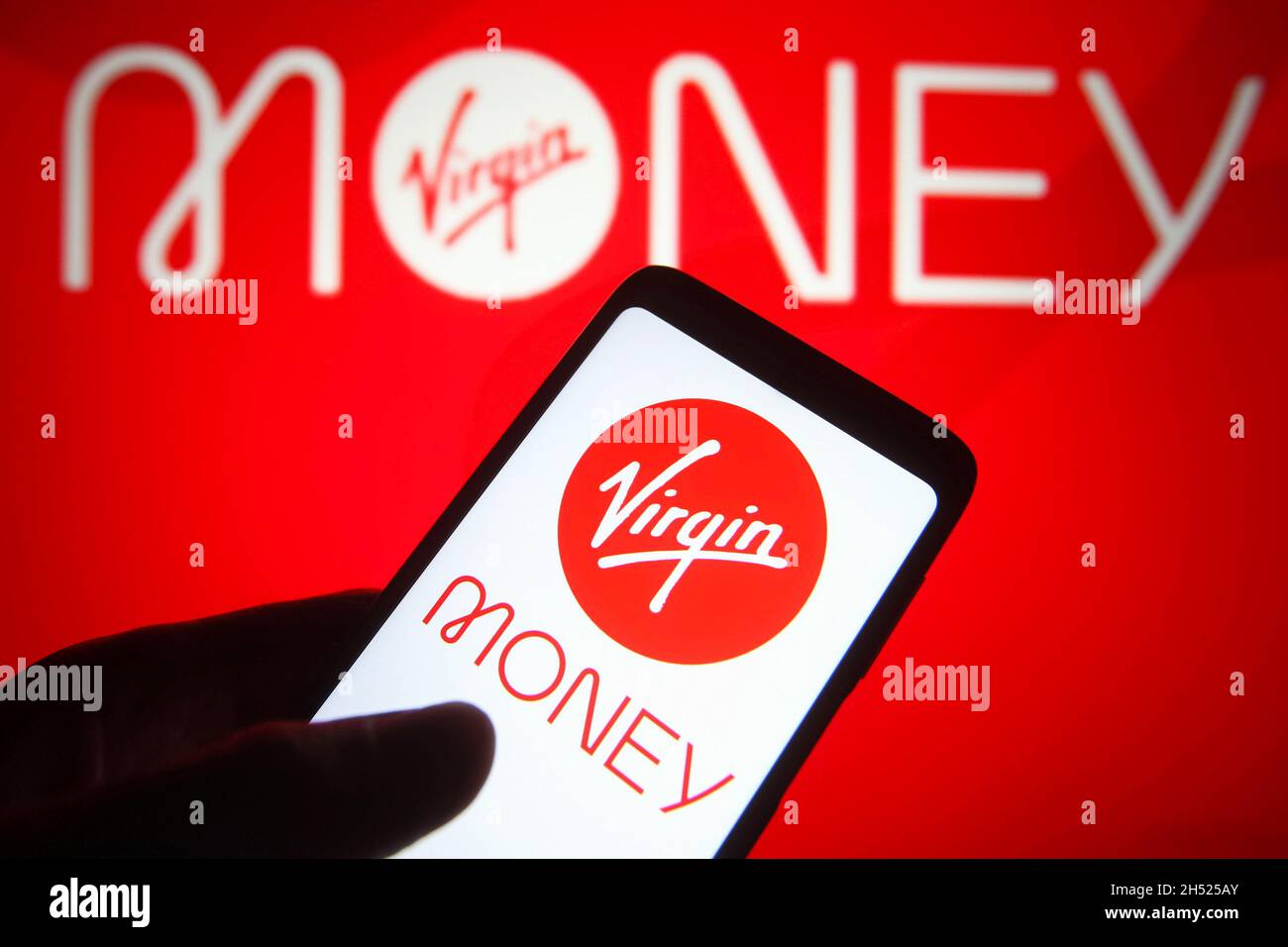 In this photo illustration, Virgin Money UK logo is seen displayed on a ...