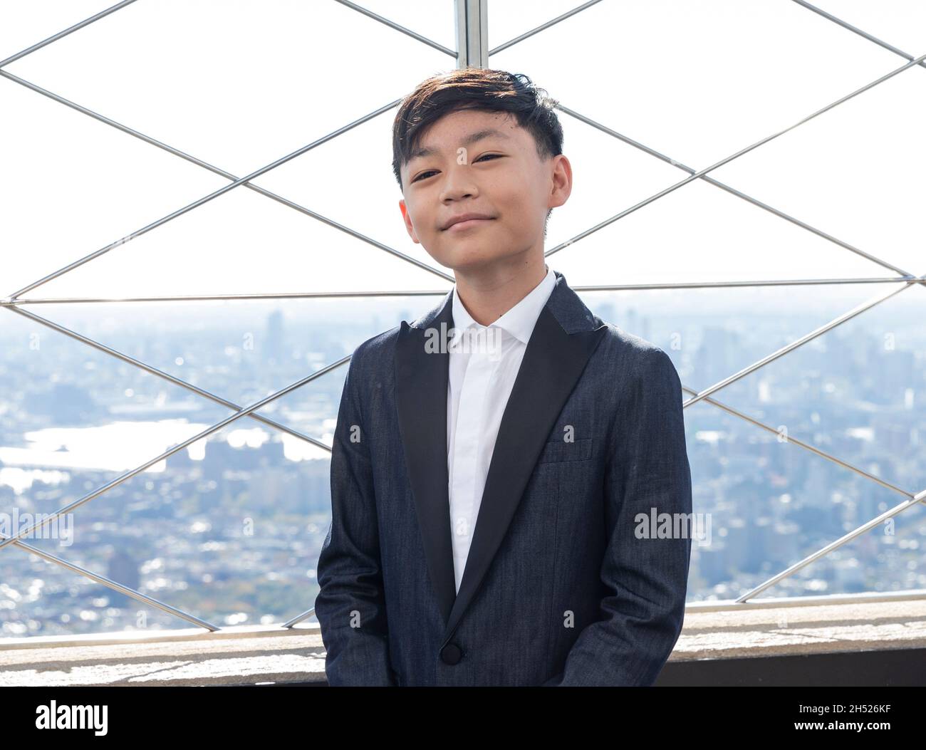 Actor Izaac Wang attends Empire State Building hosting cast of Clifford ...