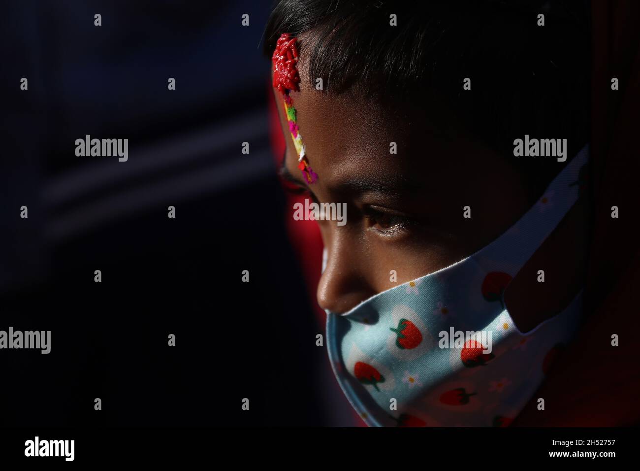 Kathmandu, NE, Nepal. 6th Nov, 2021. A women put on tika of different ...