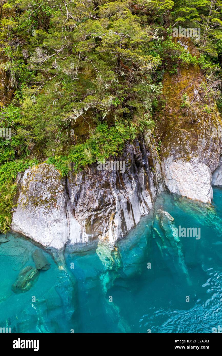 Landscapes of the World. Steep cliffs above the turquoise water. South ...