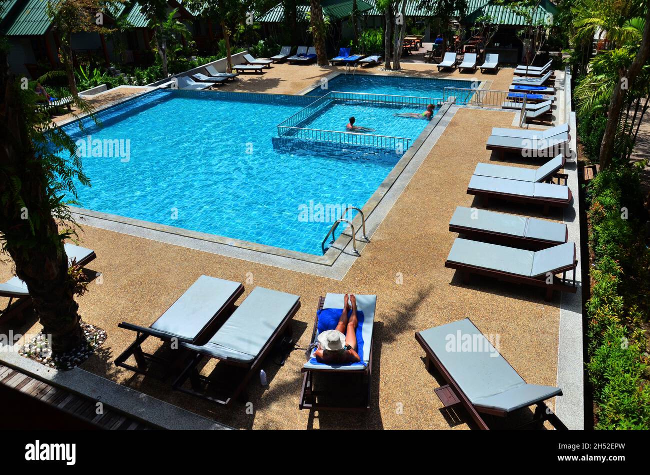 Thai people and foreign travelers travel visit swim rest relax and ...