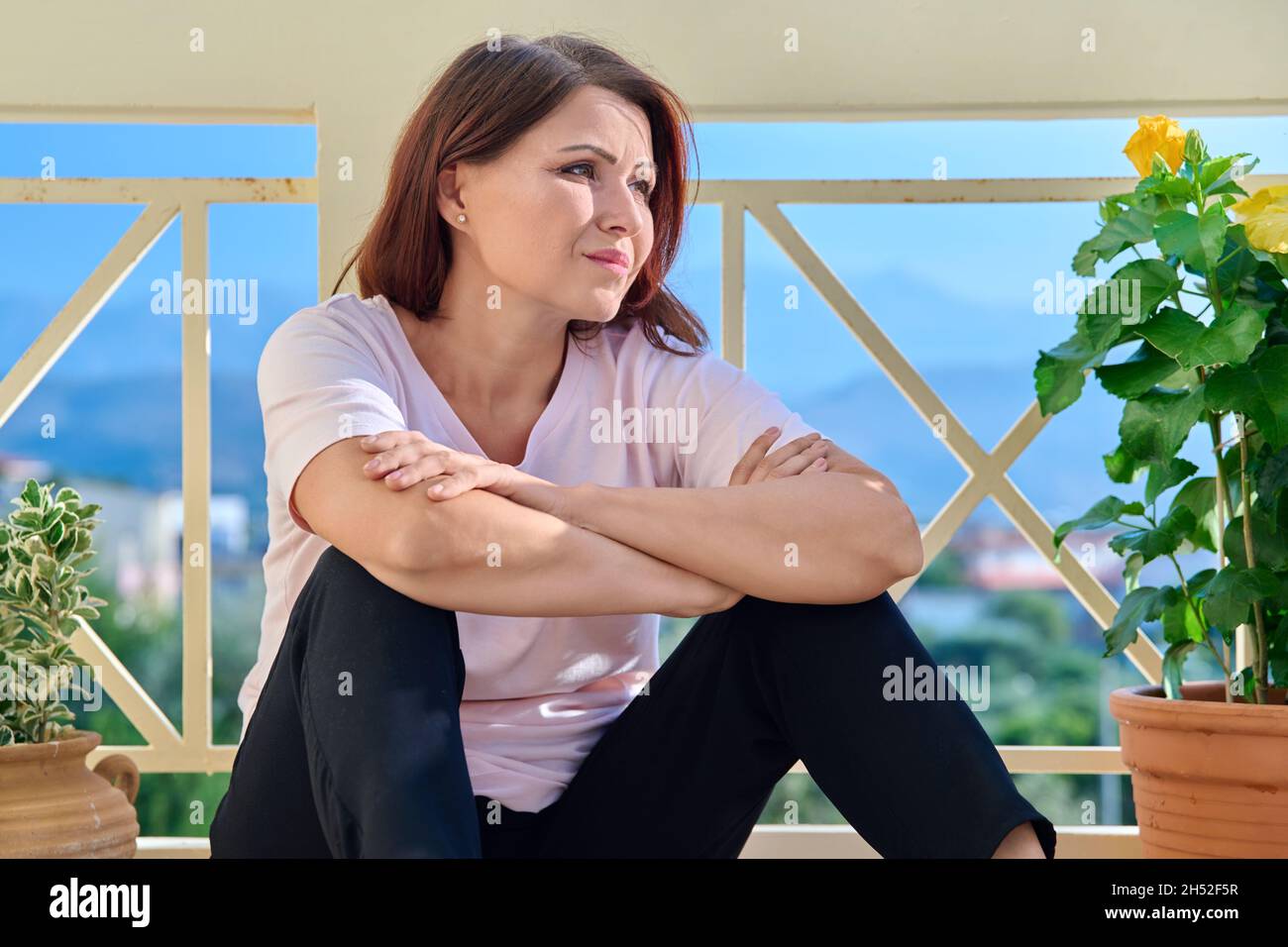 Sad middle-aged woman, problems, mental and physical health Stock Photo ...