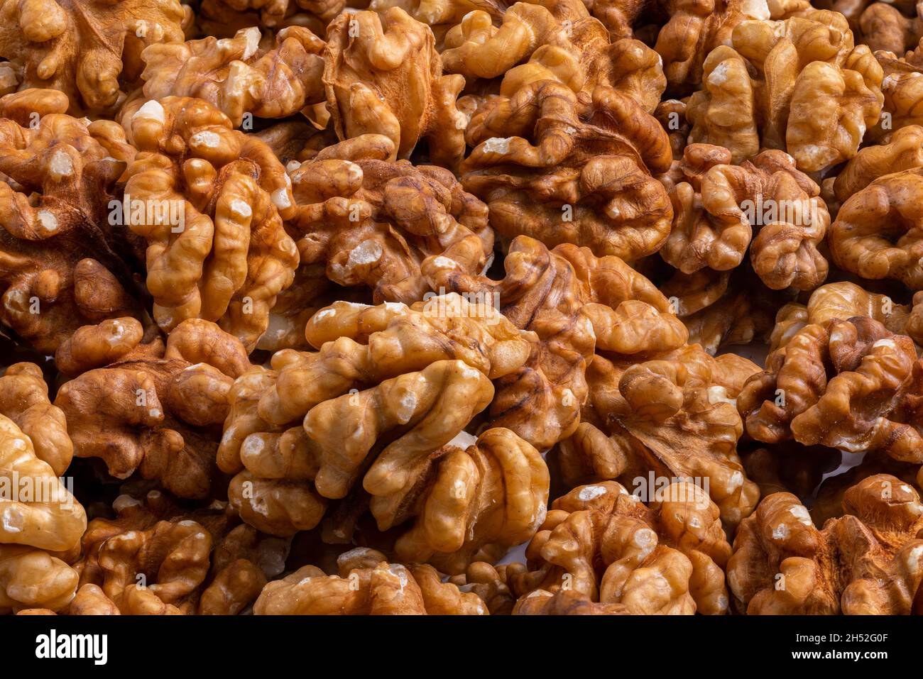 full frame close-up background of walnuts pile without shells Stock ...