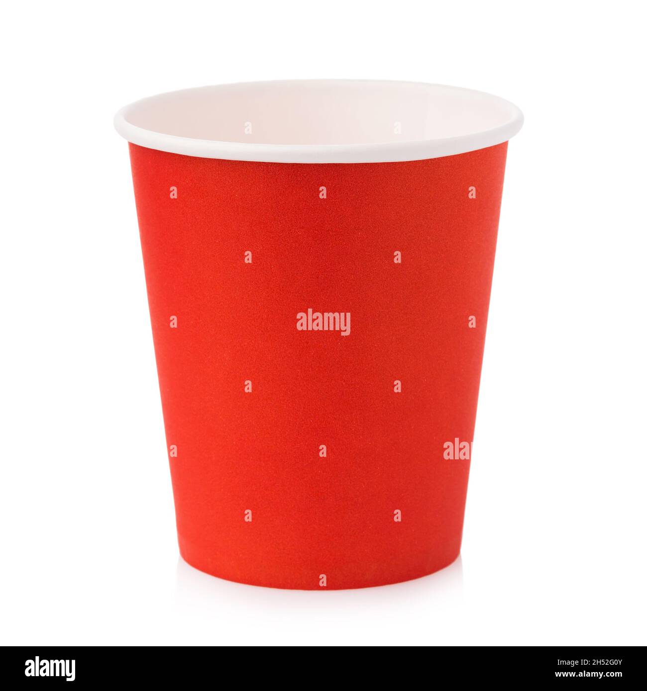 Empty paper cup for hot drinks in orange color isolated on white ...