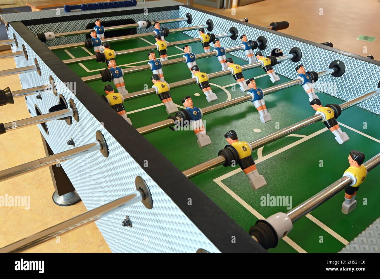 Foosball table during a break in play Stock Photo - Alamy