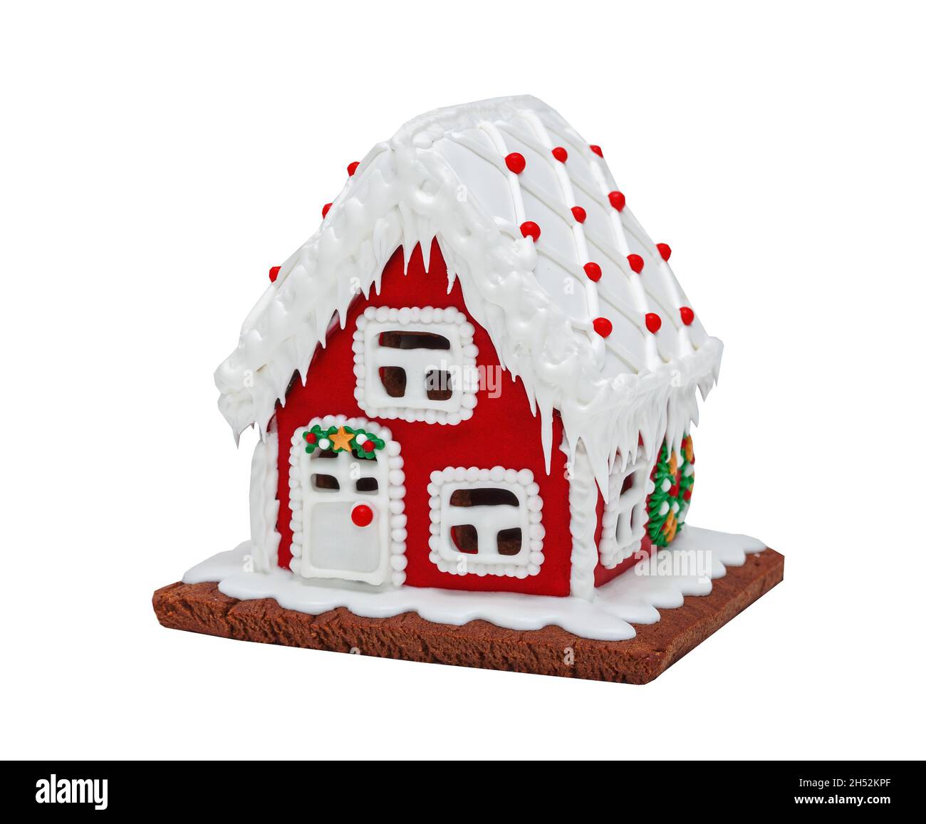 Cute gingerbread house covered with icing hi-res stock photography and ...