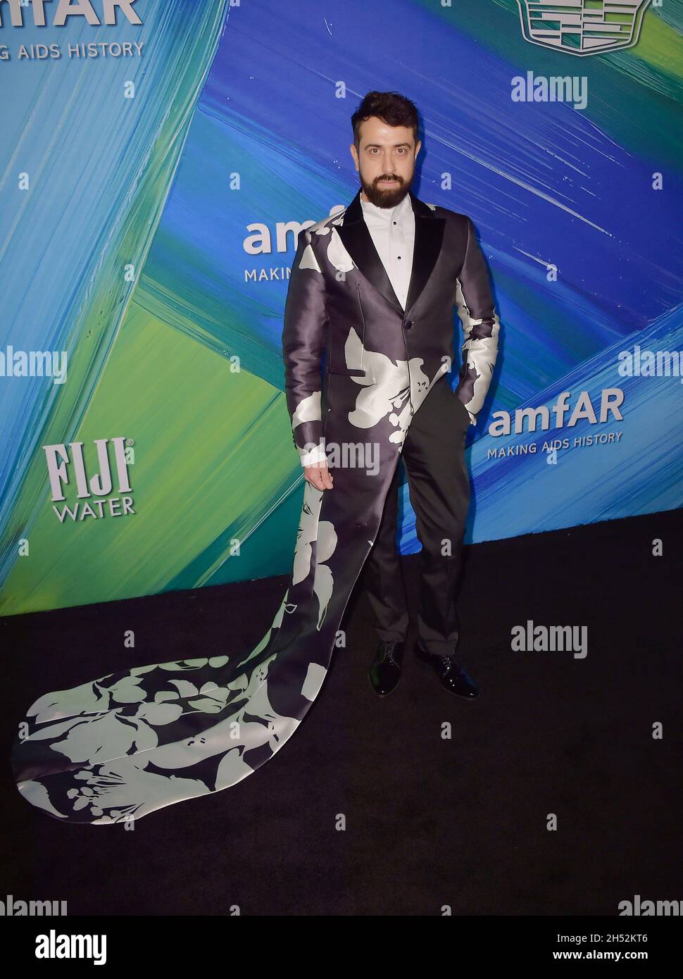 WEST HOLLYWOOD, CA - NOVEMBER 04: Viktor Luna arrives at the amfAR Gala ...