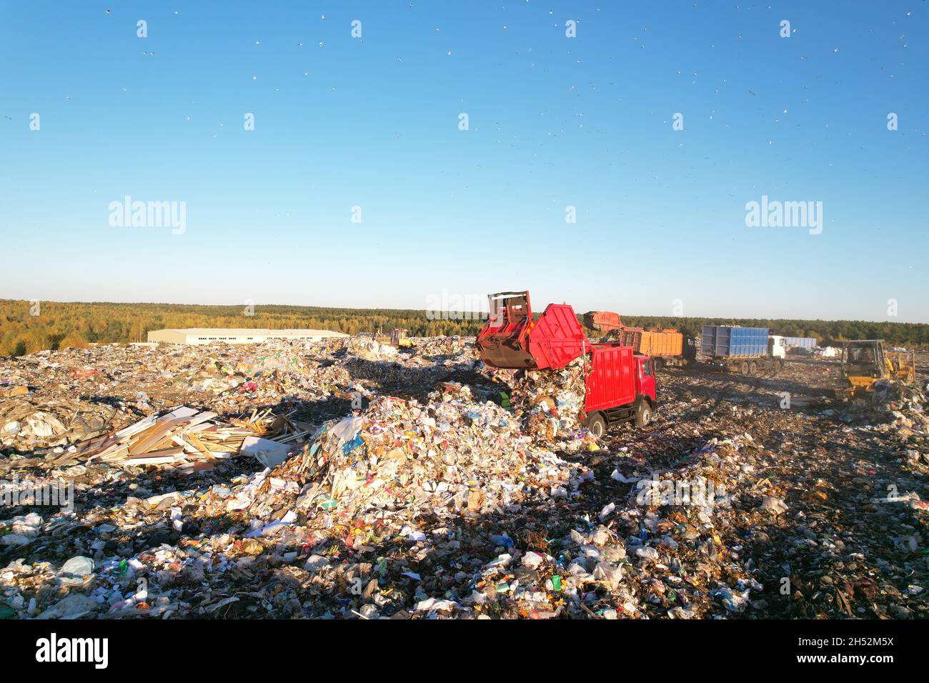 Landfill waste disposal. Garbage dump with waste plastic and ...