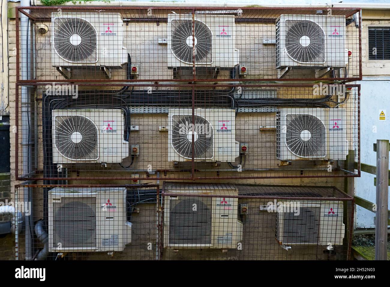 Air conditioning units on the side of a building hi-res stock ...
