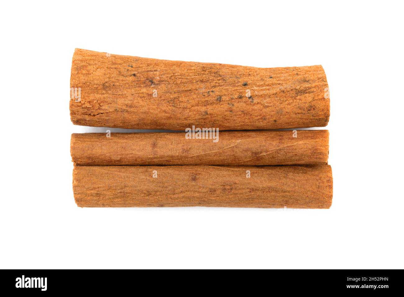 Cinnamon sticks close-up, isolated on a white background photo Stock ...