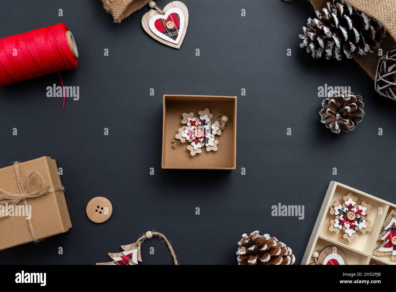 Concept of making Christmas gifts with small boxes and decorations for ...