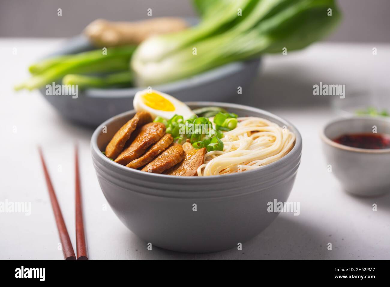 Ramen is asian noodles in a bowl with meat and vegetables or seafood ...