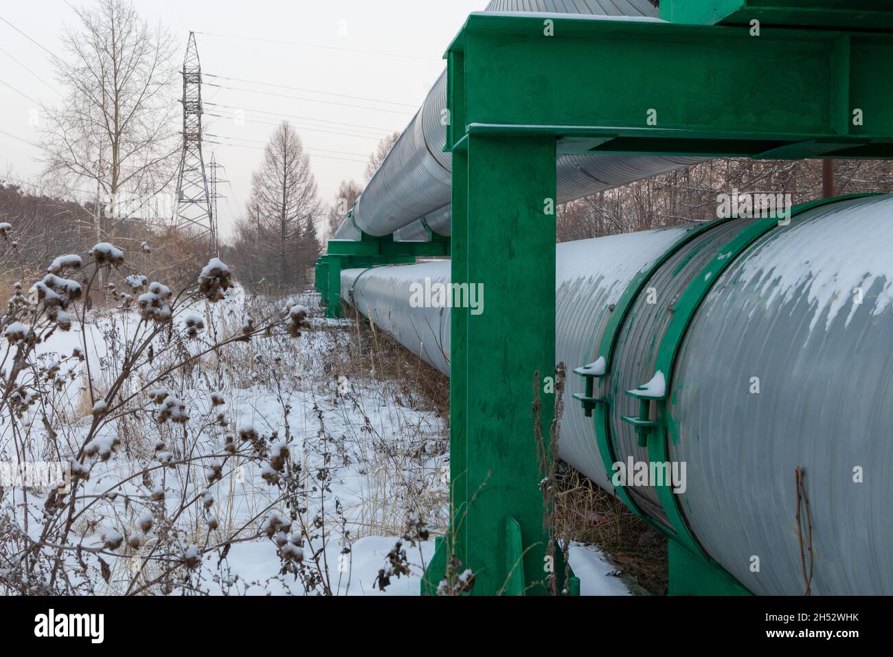central heating pipes in a protective metal thermal insulation jacket ...
