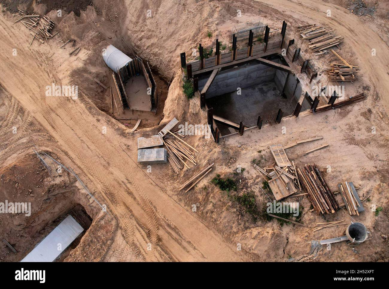 Construction of stormwater pits and sanitary sewer system. Laying of ...