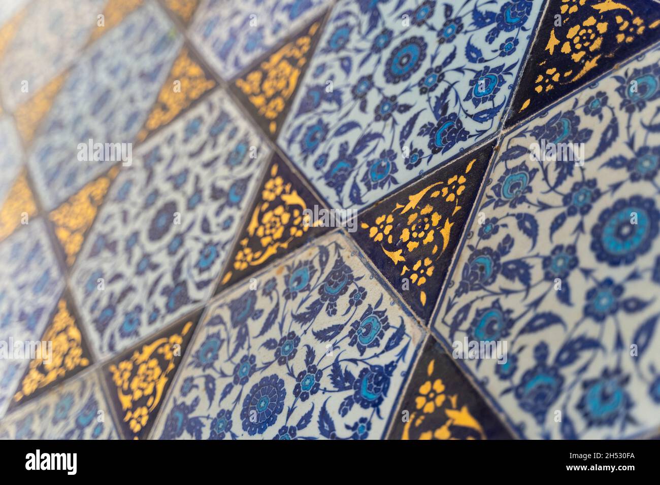 front view close up of Islamic ottoman era blue ceramic ornament decoration in Topkapi Palace ...