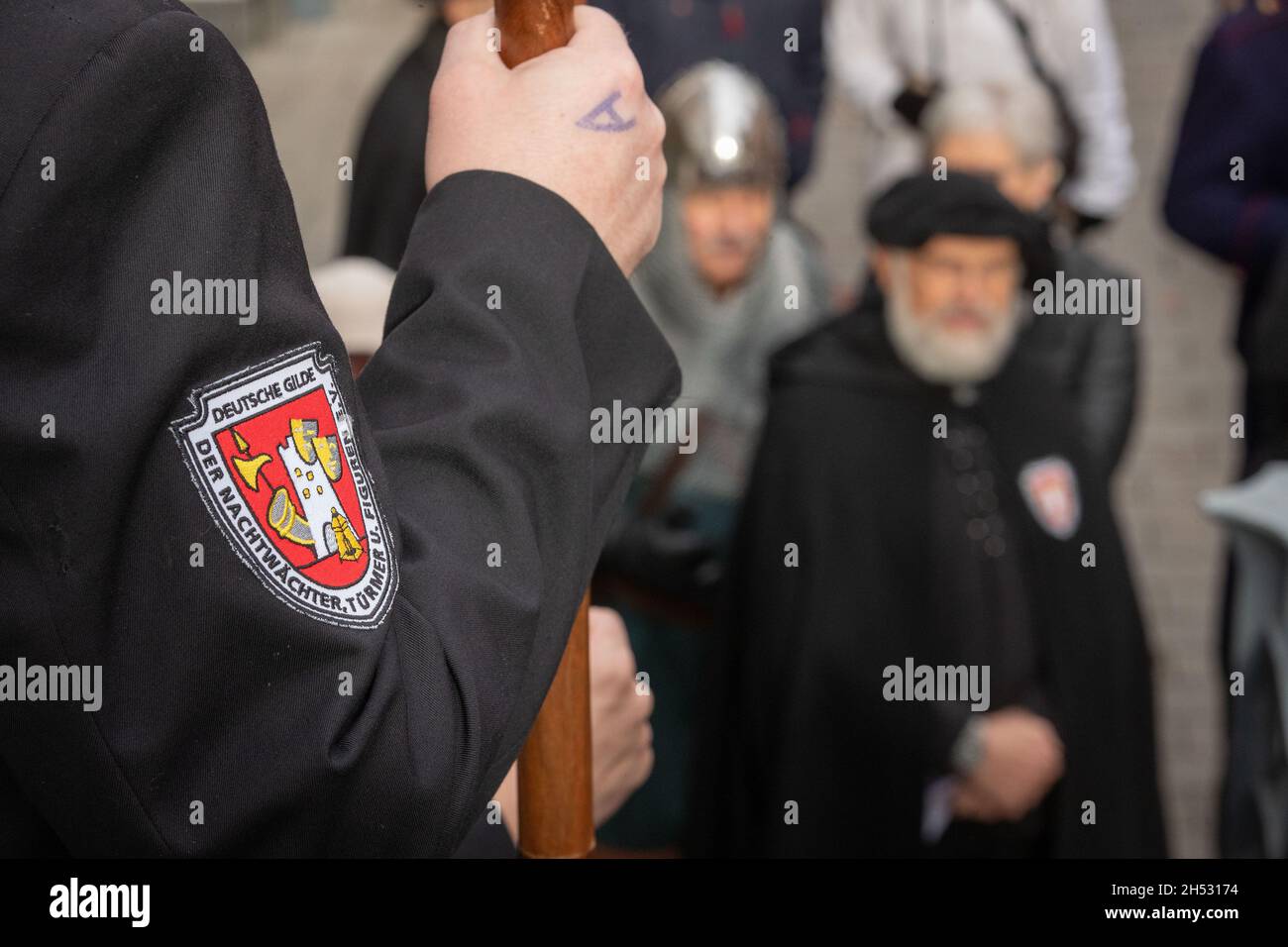 Lippstadt, Germany. 06th Nov, 2021. A participant wears a coat of arms ...