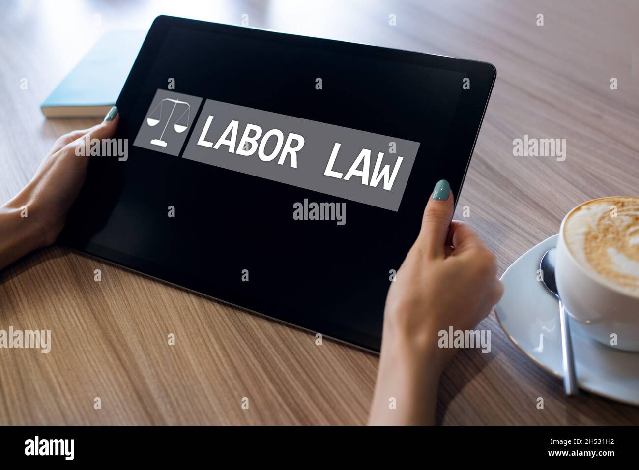 Labor law icon and text on device screen Stock Photo - Alamy