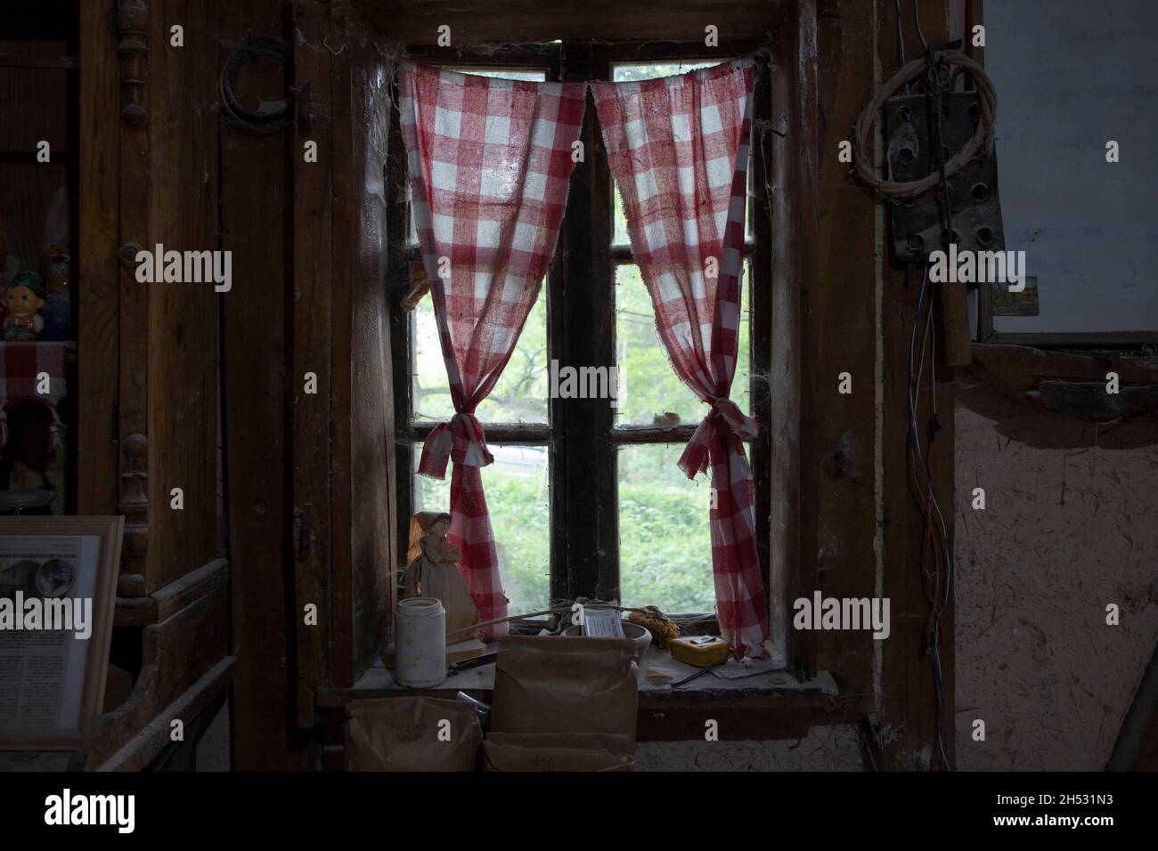 Window of an ancient mill house Stock Photo - Alamy
