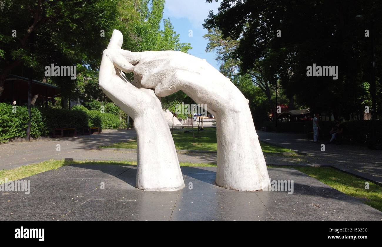 Two white marble hands statue monument in downtown Yerevan loving ...