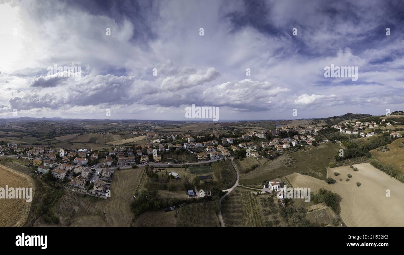 Aerial shot of a small town with stone houses and a cloudy sky Stock ...