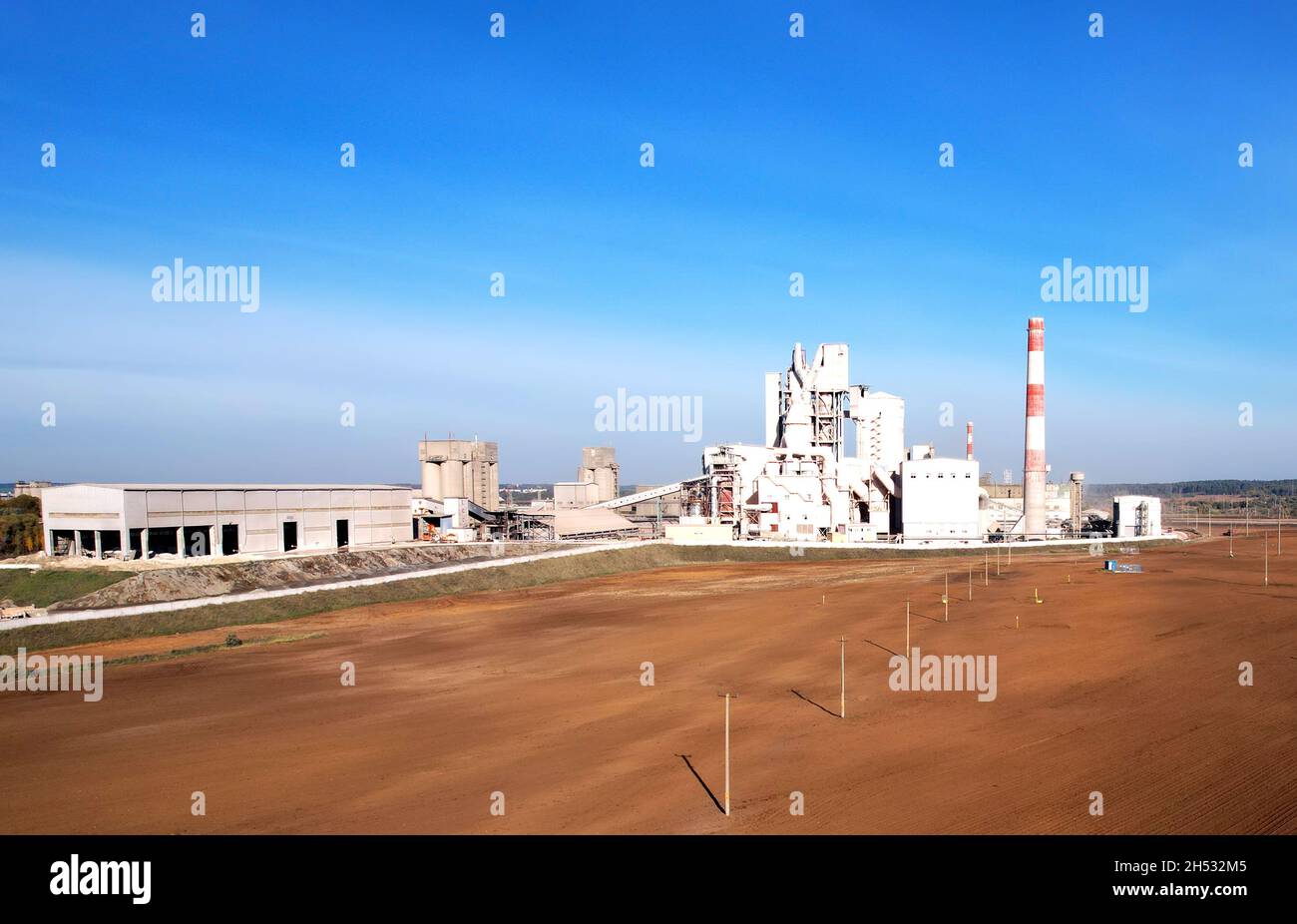 Cement plant with pipes. ement production process and Industrial ...
