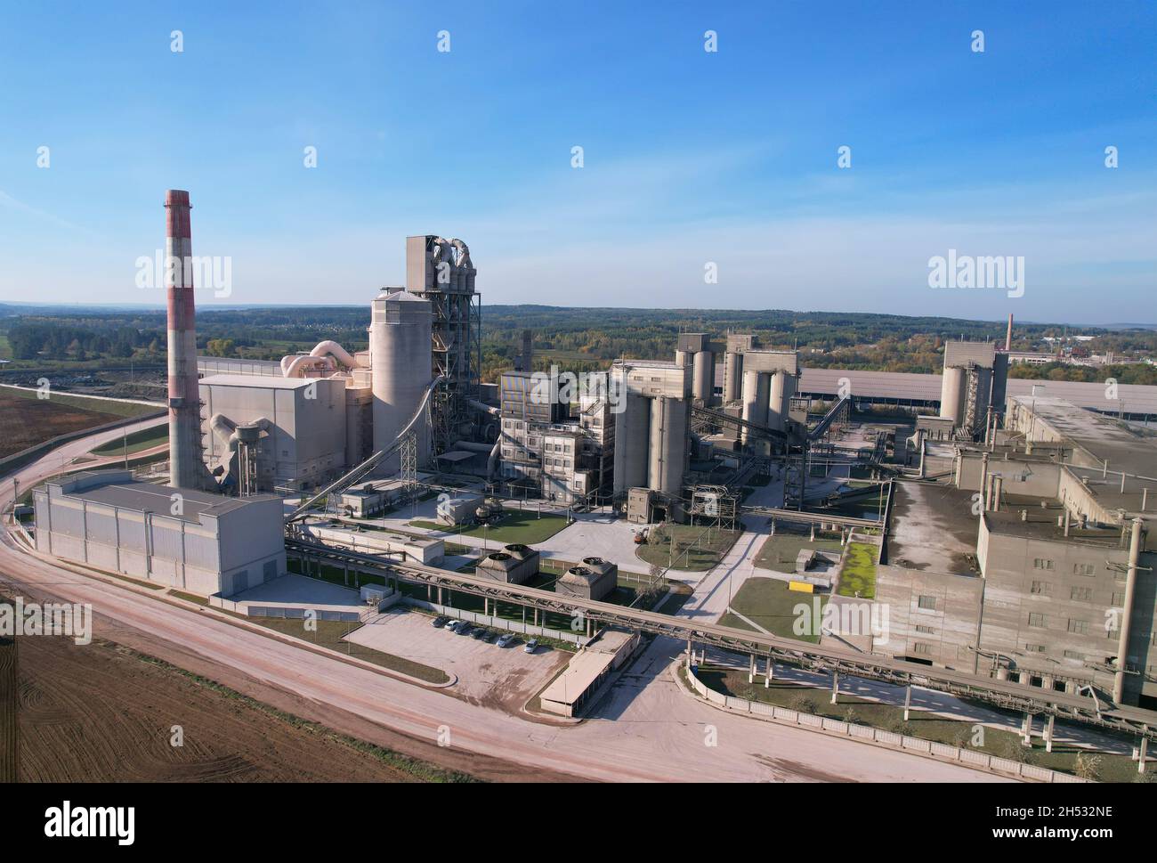 Cement plant with pipes. ement production process and Industrial ...
