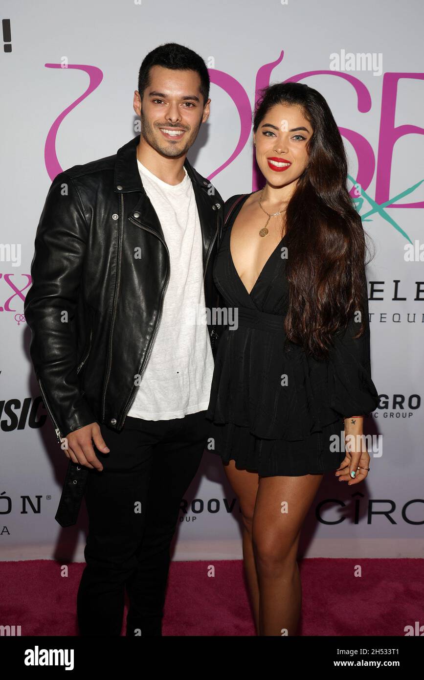 MIAMI, FL - NOVEMBER 5: Mauricio Novoa and Denise Novoa attend the ...