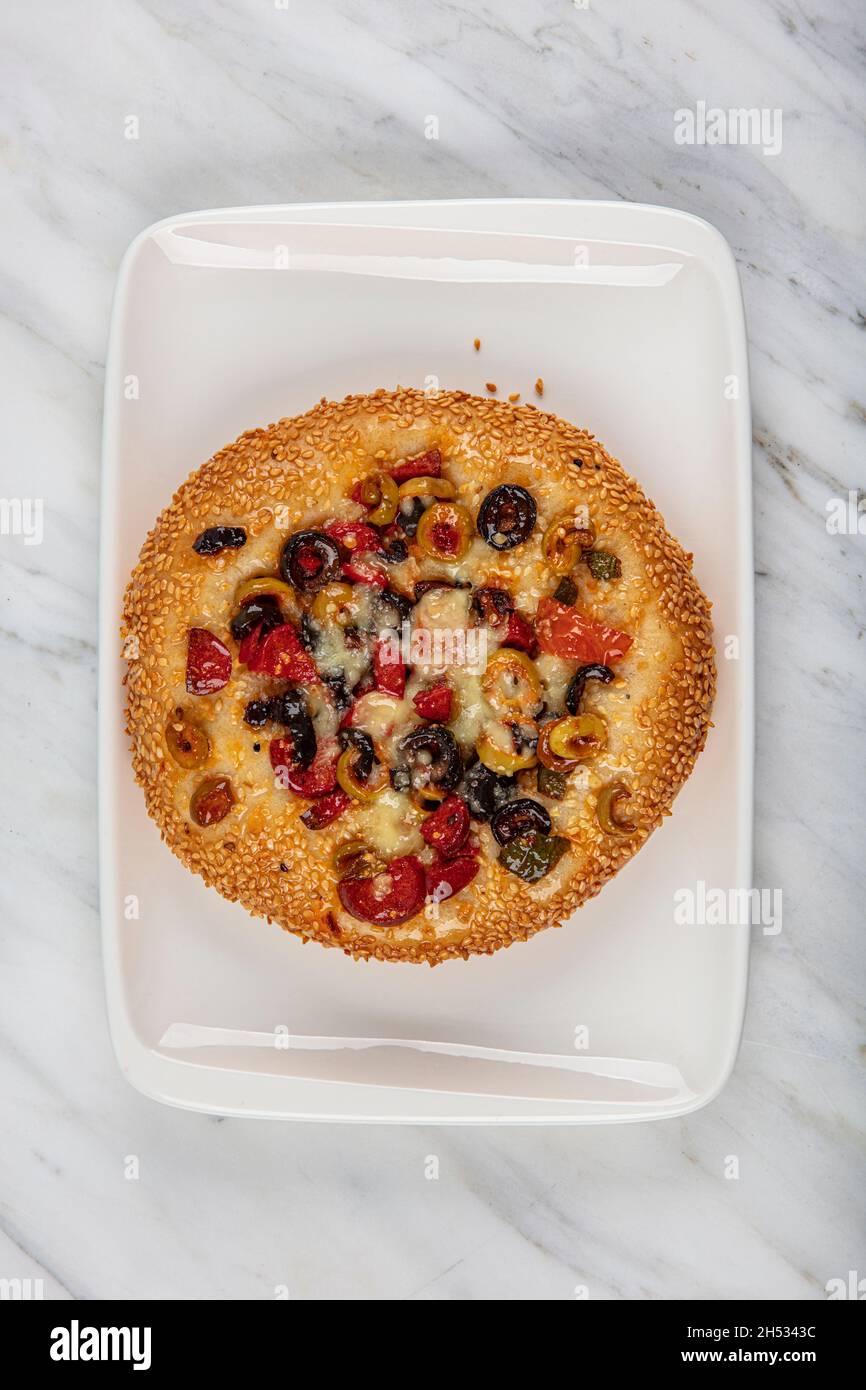 Turkish cuisine minced Mini Pizza. Puff pastry mini pizza with tomato ...