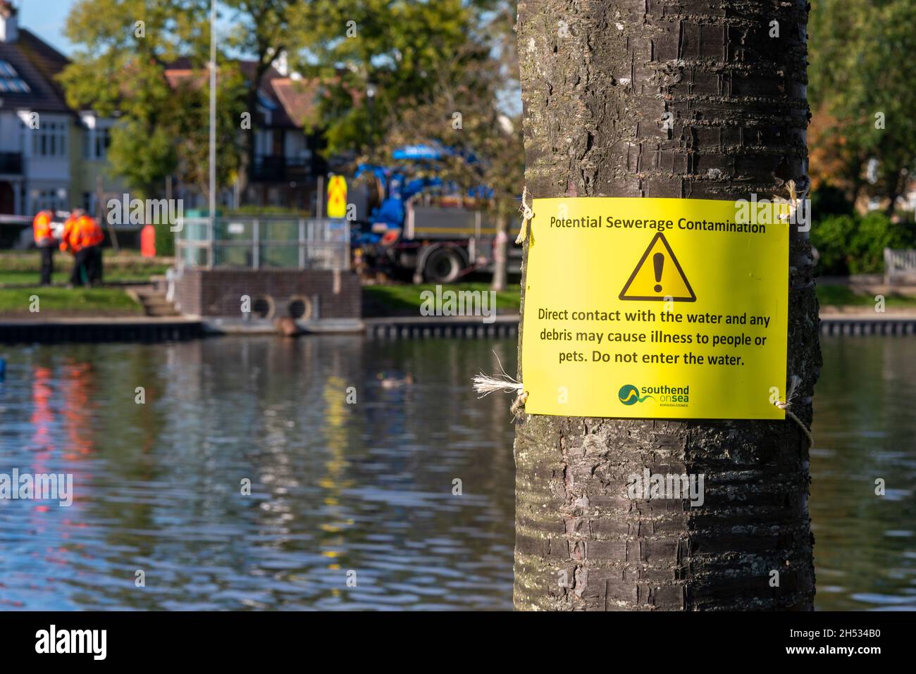 Warning signs around Southchurch Park Lake warning visitors that direct ...