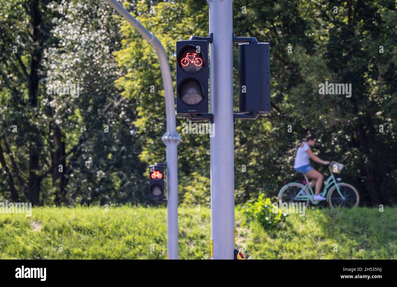 Red traffic light on a bicycle crossing in Warsaw, capital city of ...