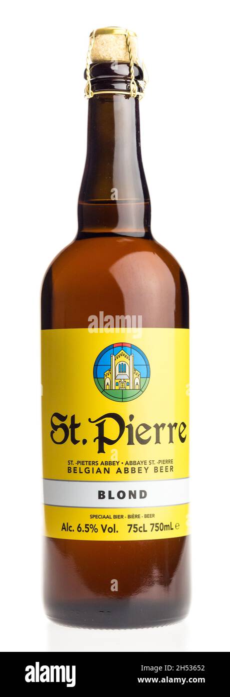 Large bottle of St. Pierre Blond beer isolated on a white background ...
