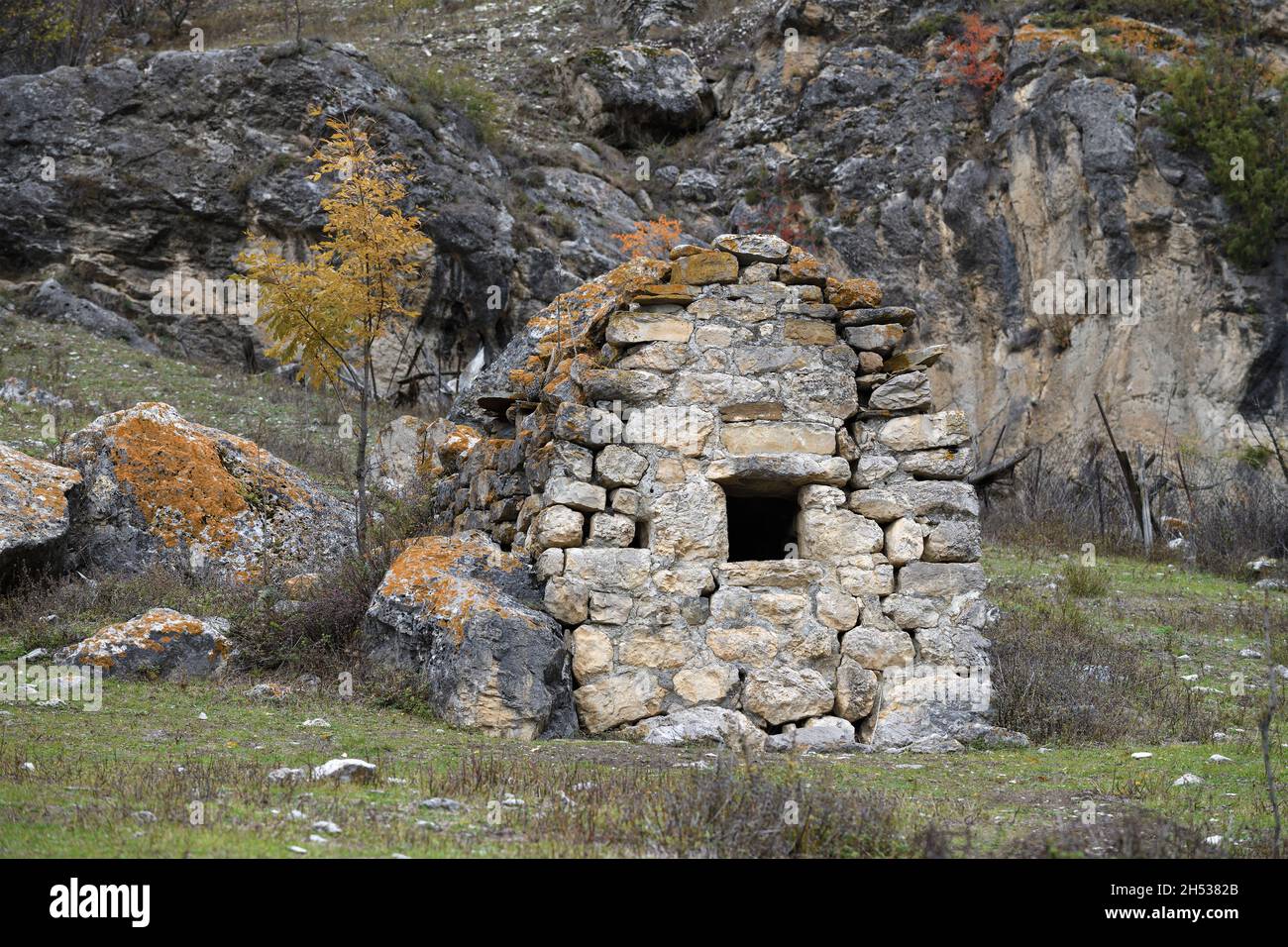 The ancient Ossetian grave crypt is close-up. Dzivgis, North Ossetia ...