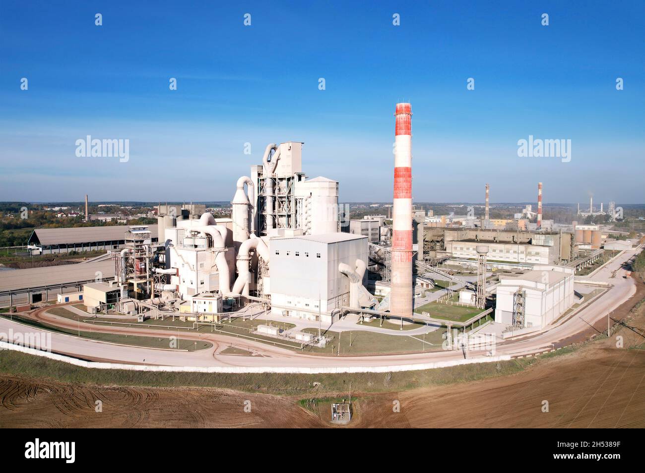 Cement plant with pipes. ement production process and Industrial ...