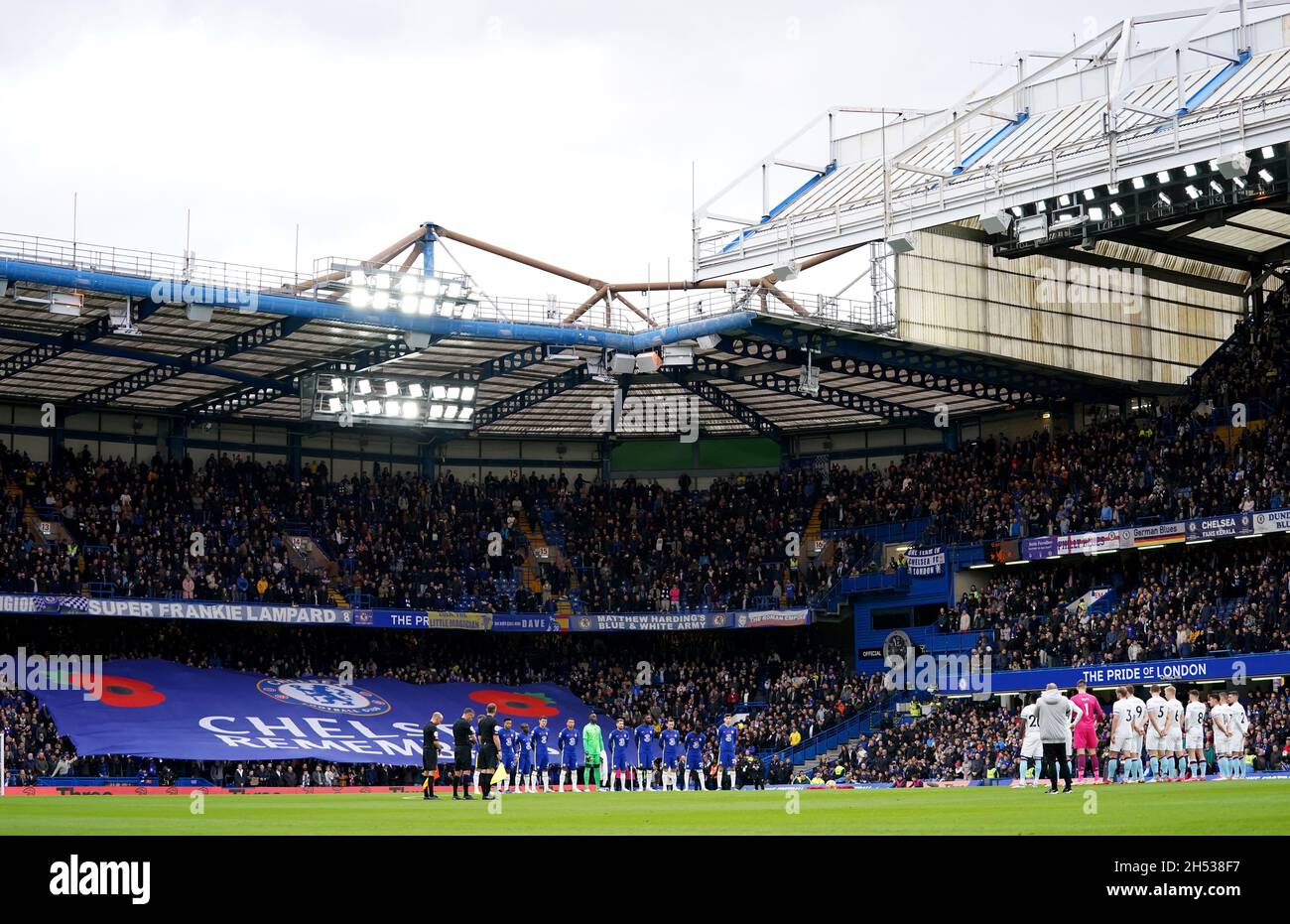Chelsea and Burnley players observe a moments silence in honour of ...