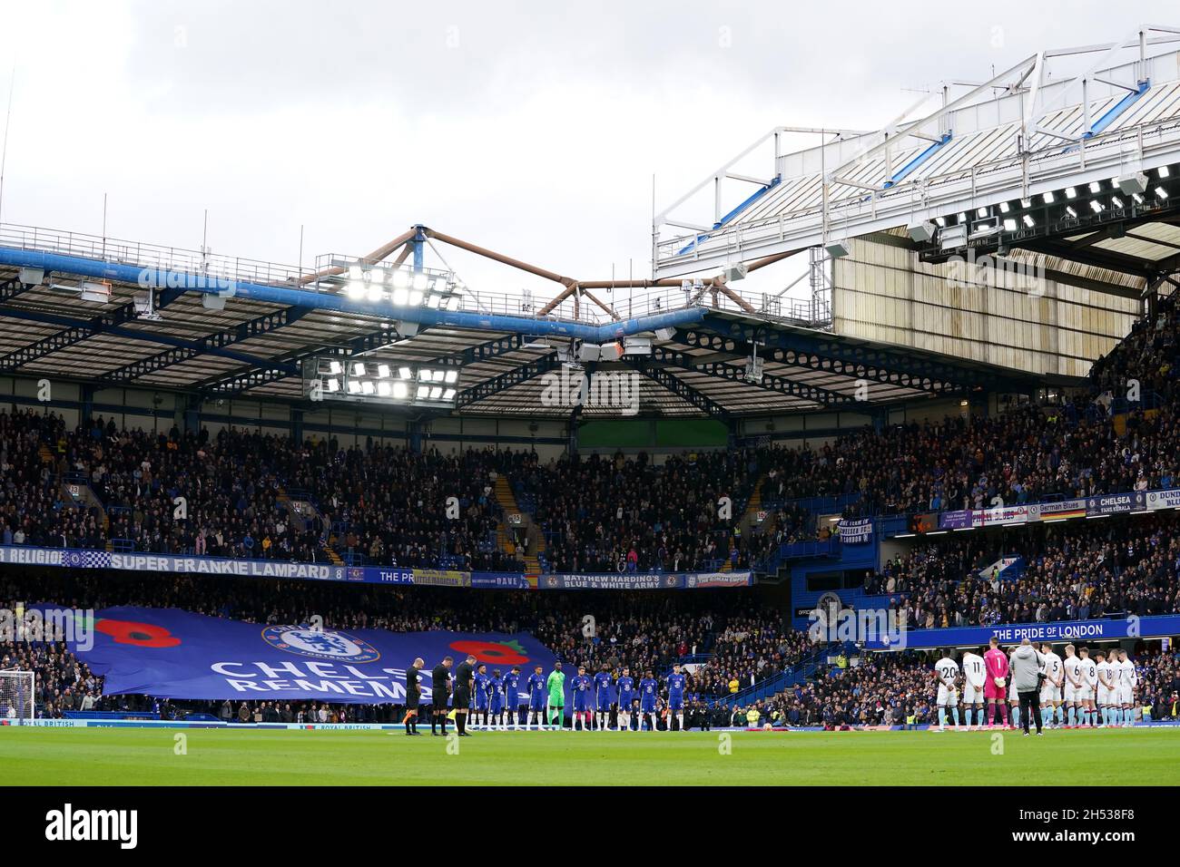 Chelsea and Burnley players observe a moments silence in honour of ...